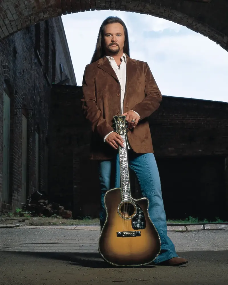 Travis Tritt – Between an Old Memory and Me – OldiesSong